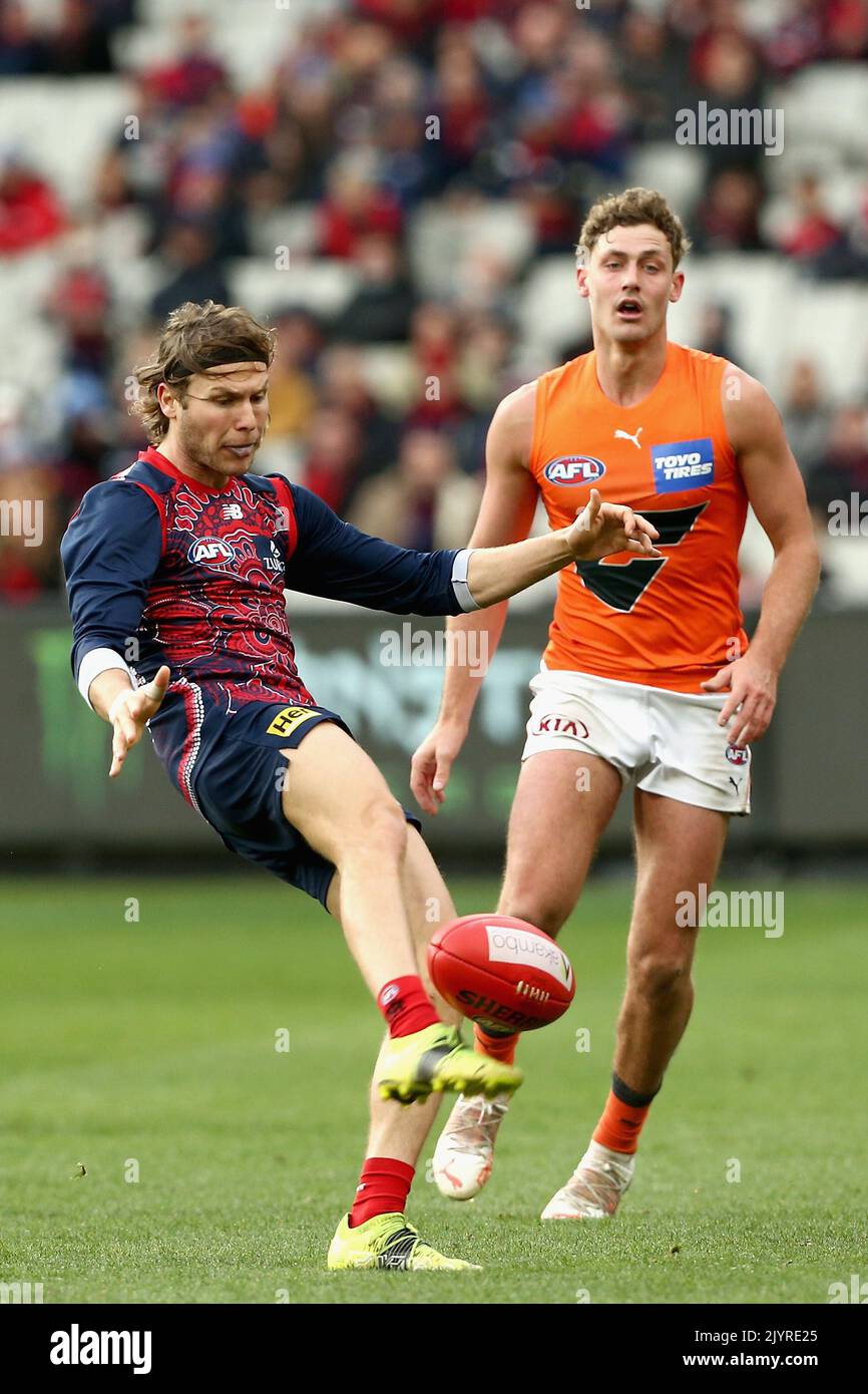 Ed Langdon of the Demons kicks the ball during the AFL Round 16Êmatch ...