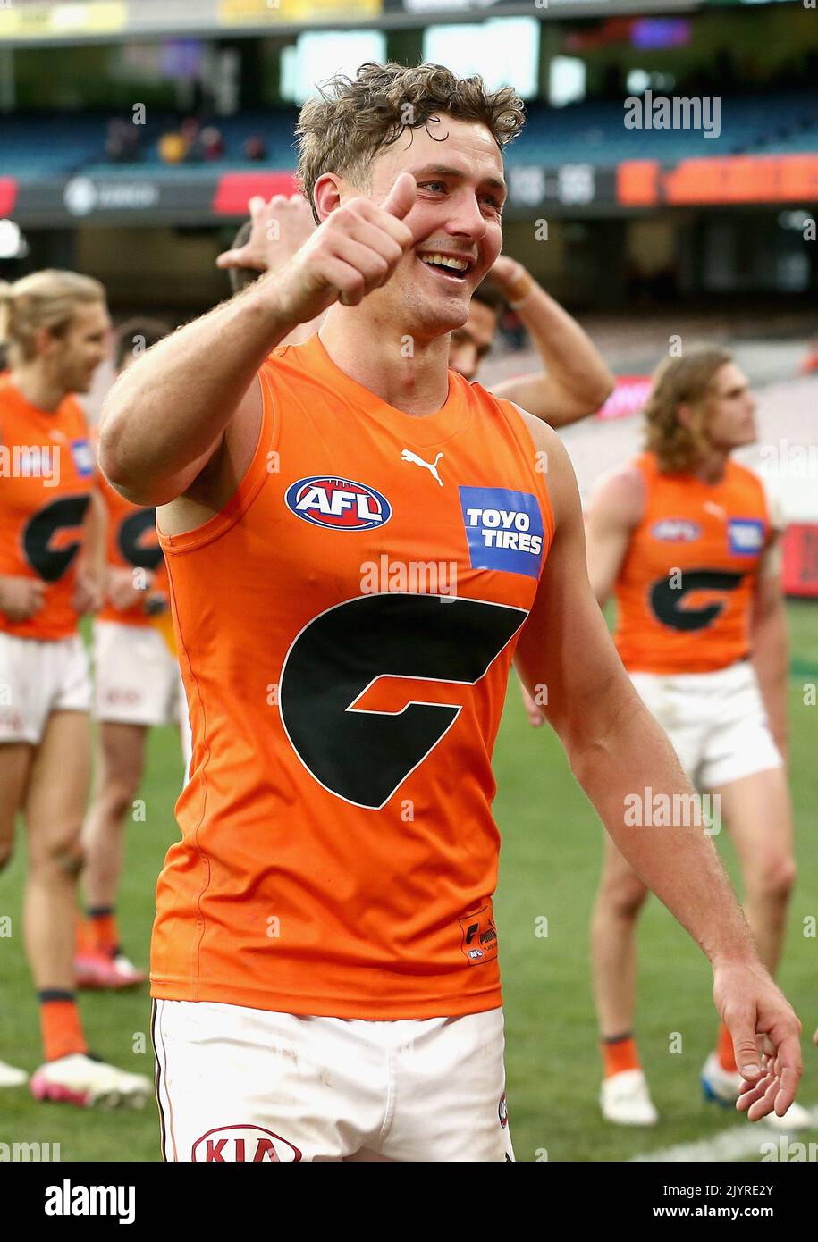 Harry Perryman of the Giants celebrates a win during the AFL Round ...