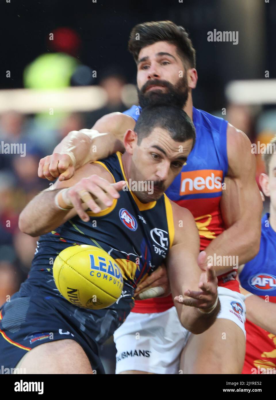 Marcus Adams of the Lions and Taylor Walker of the Crows during the AFL ...