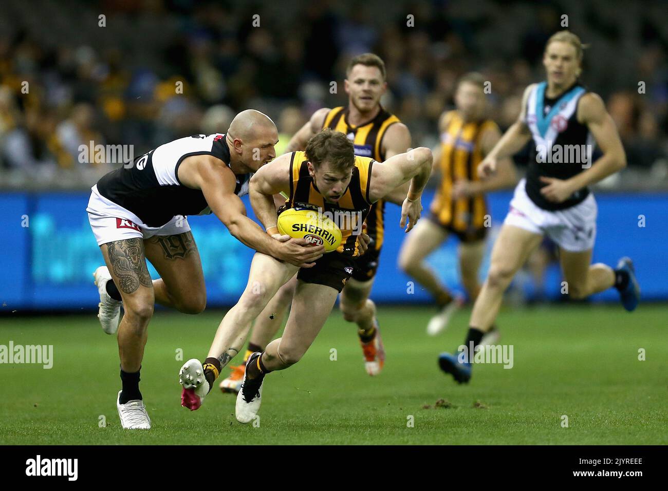 Lachlan Bramble of the Hawks is tackled during the AFL Round 16Êmatch ...