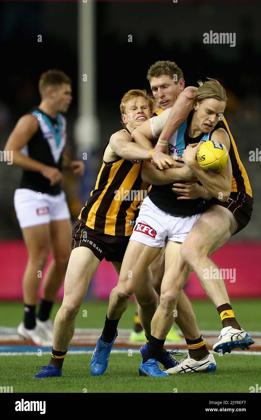 Miles Bergman of the Power is tackled during the AFL Round 16Êmatch ...