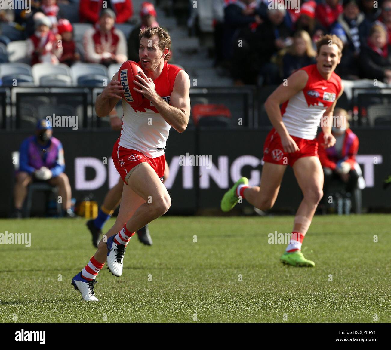 Harry Cunningham of the Swans runs forward during the Round 16 AFL ...