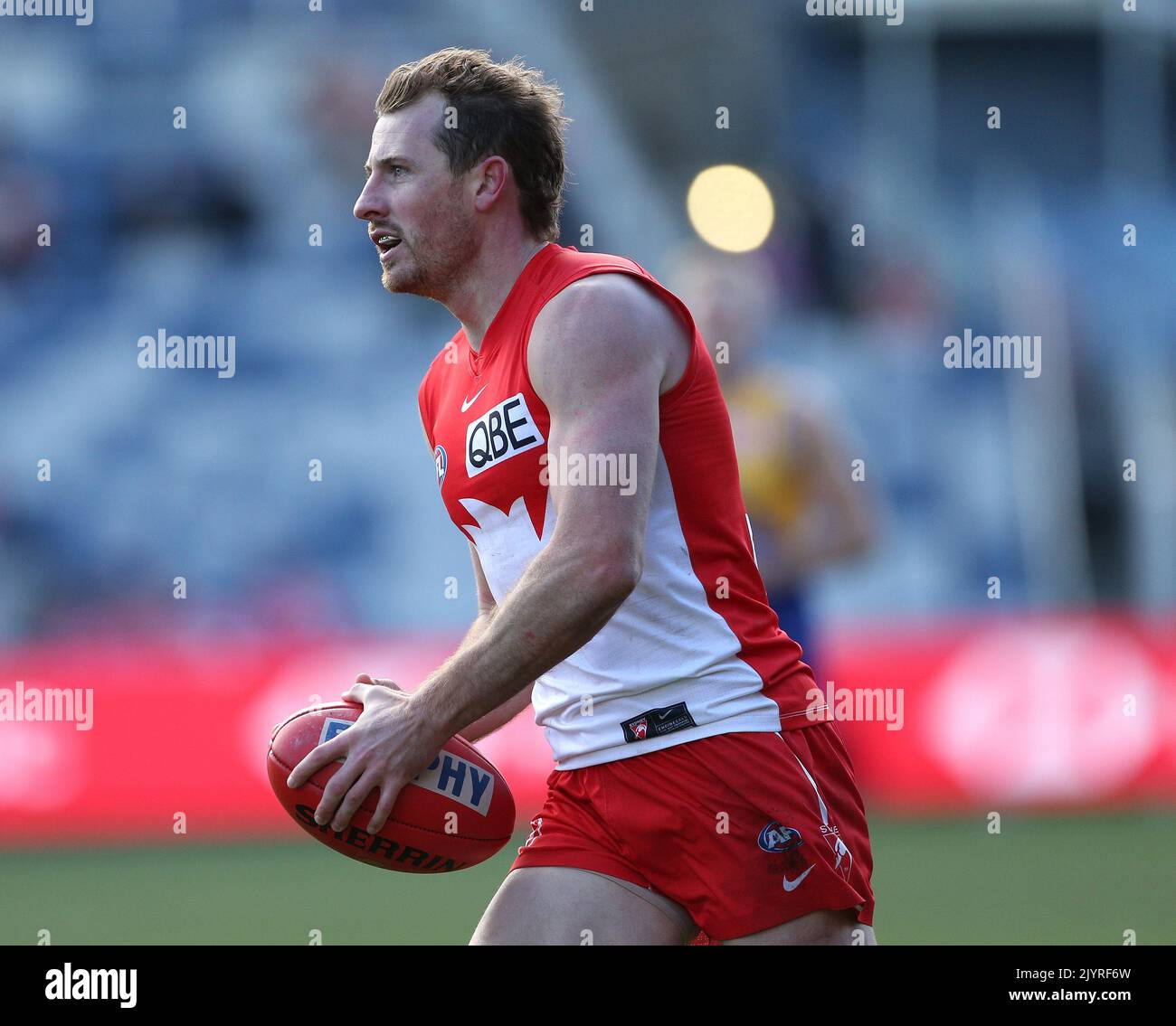 Harry Cunningham of the Swans runs forward during the Round 16 AFL ...