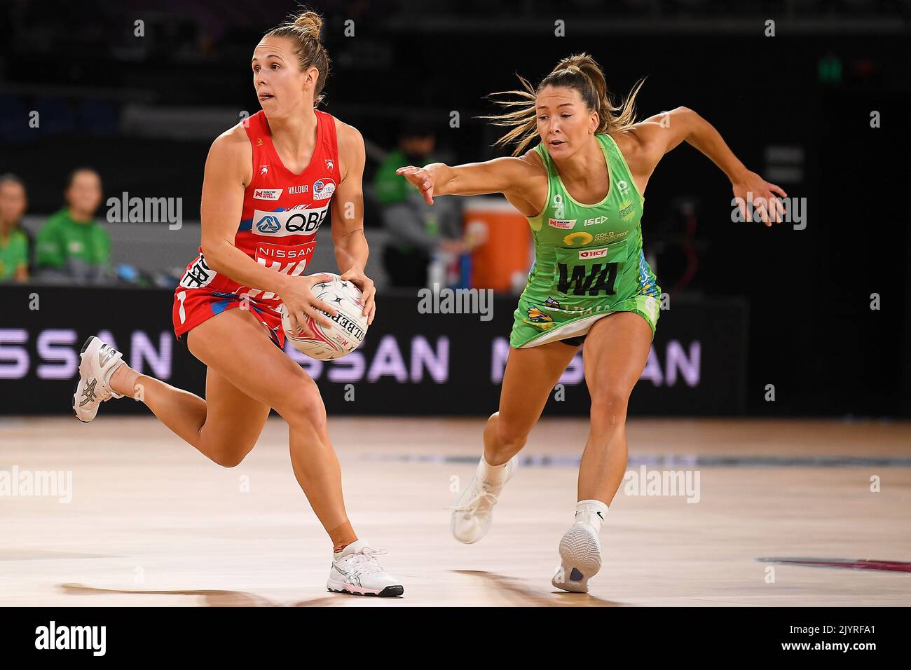 Maddy Proud of the Swifts (left) and Verity Charles of the Fever in ...