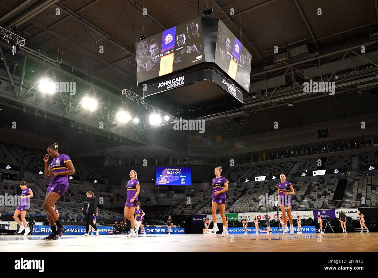 Firebirds players warm up ahead of the Round 9 Super Netball match ...