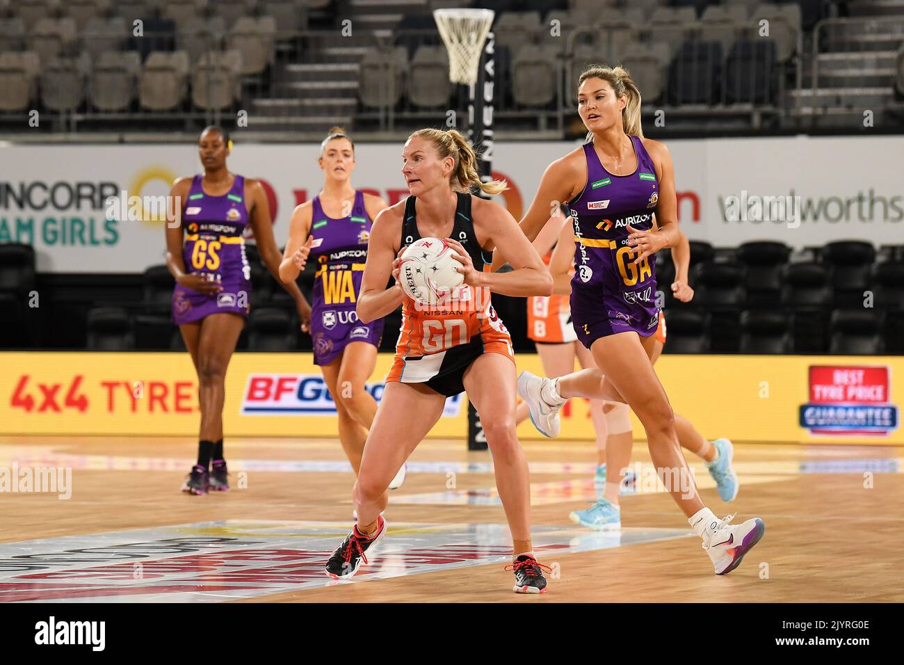 April Brandley (centre) of the Giants in action during the Round 9 ...