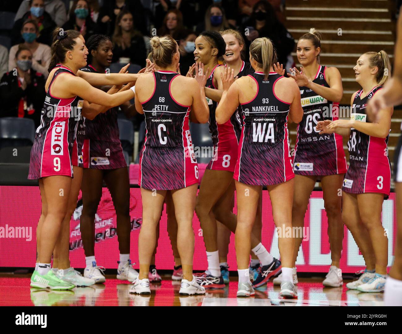 Shamera Sterling of the Thunderbirds enters the court with team mates ...