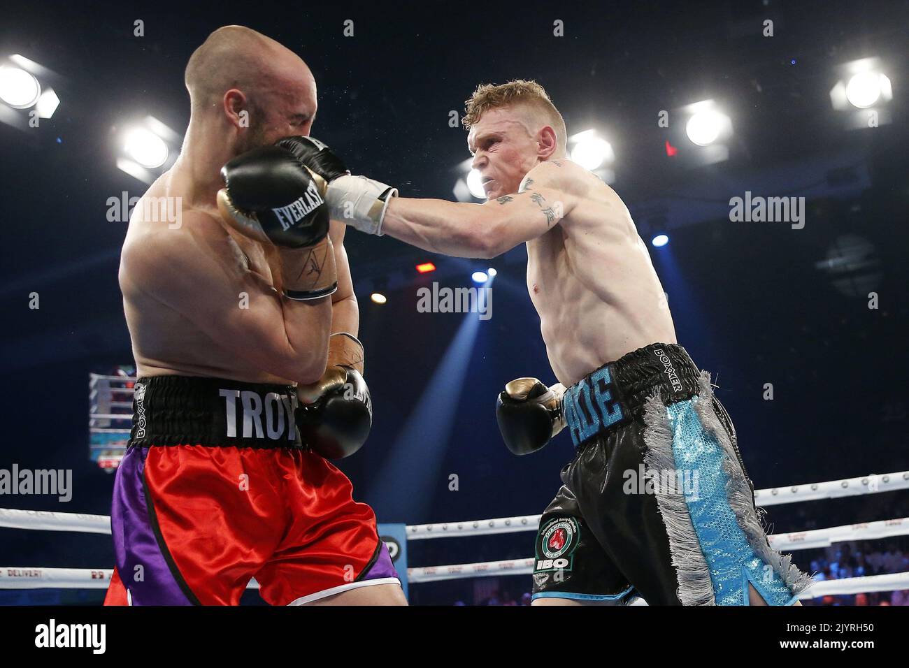 Wade Ryan (right) and Troy O’Meley in their undercard bout, the IBO ...
