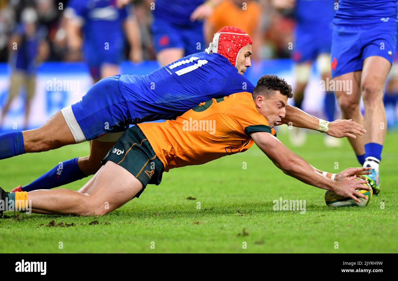 Tom Banks (right) of the Wallabies grounds the ball only to be ruled no ...