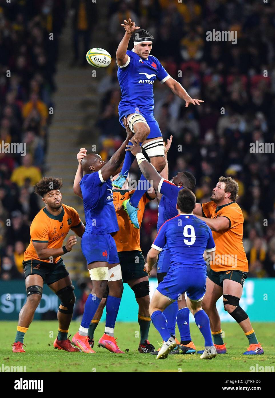 Dylan Cretin (top) of France in action during the line out during the ...