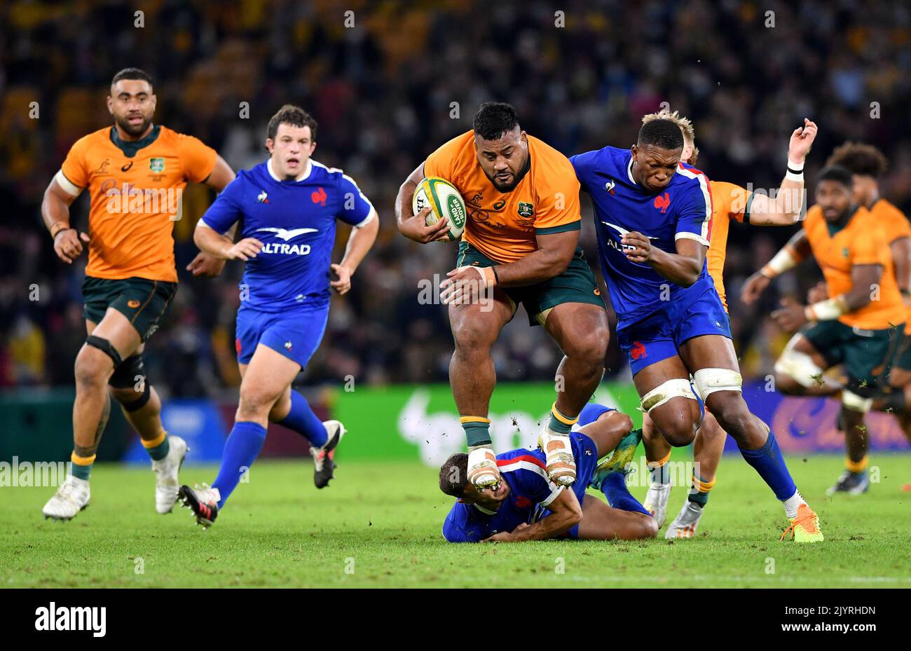 Taniela Tupou (centre) of the Wallabies makes a break during the First ...