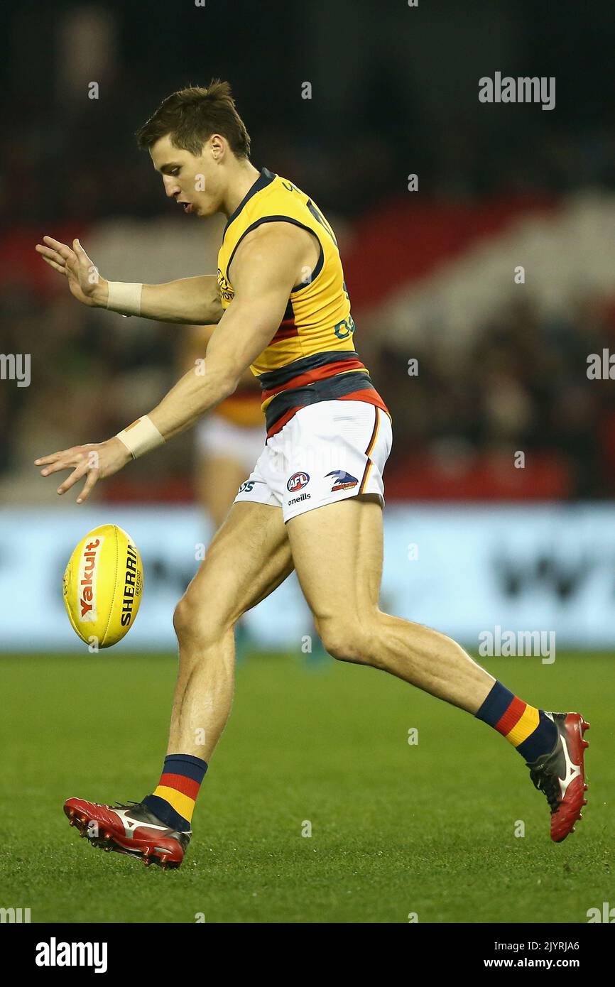 Jake Kelly of the Crows kicks the ball during the Round 17 AFL match ...