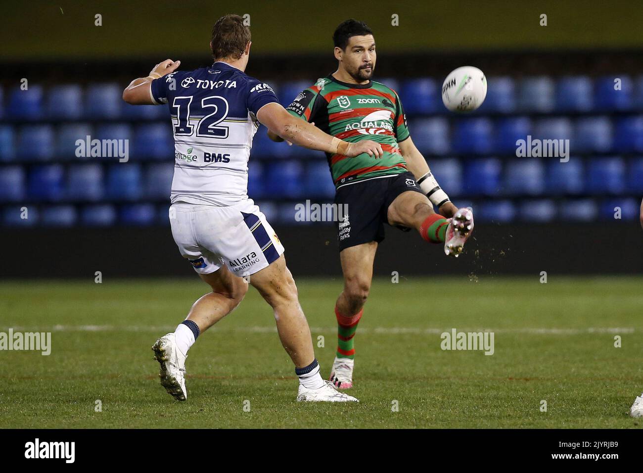 Adam Reynolds of the Rabbitohs puts in a kick during the Round 17 NRL ...