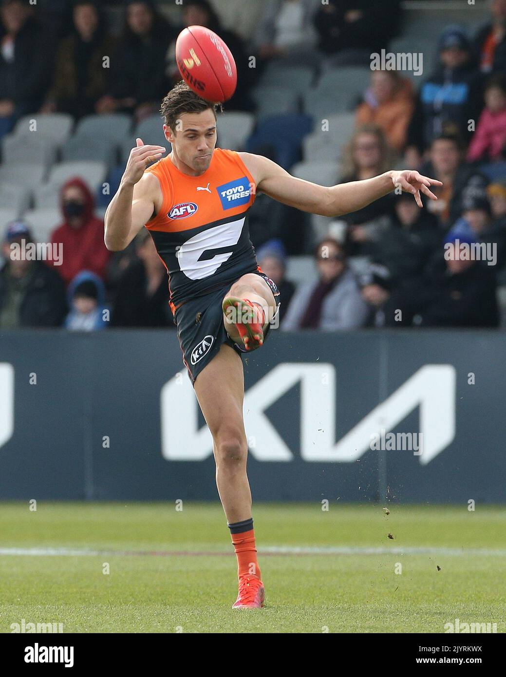 Josh Kelly of the Giants kicks forward during the Round 17 AFL match ...