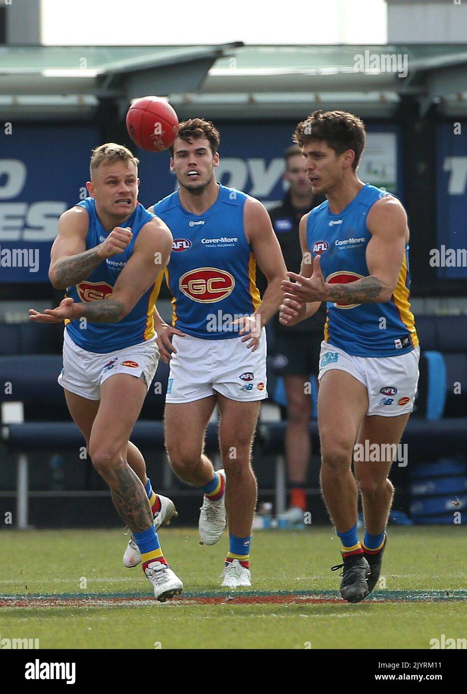 Brandon Ellis of the Suns handpasses during the Round 17 AFL match ...