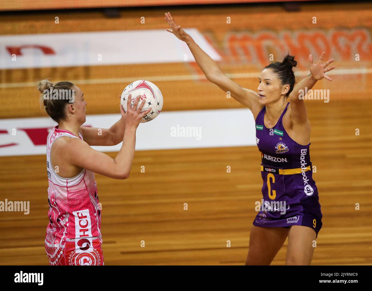 Kim Ravaillion of the Firebirds defends Hannah Petty of the ...