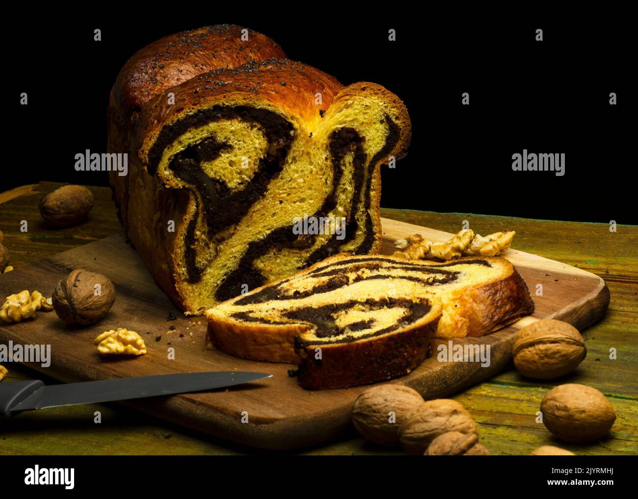 Slices of homemade traditional Romanian sweet bread. Loaf of bread on ...
