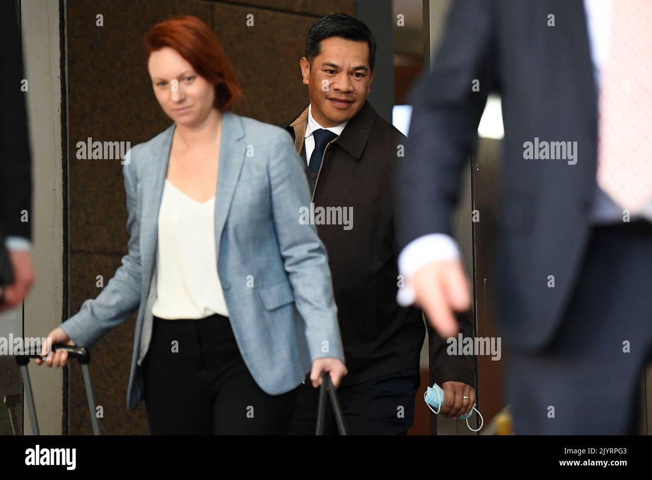 Simiona Tuteru (centre) departs the Melbourne Magistrates Court in ...