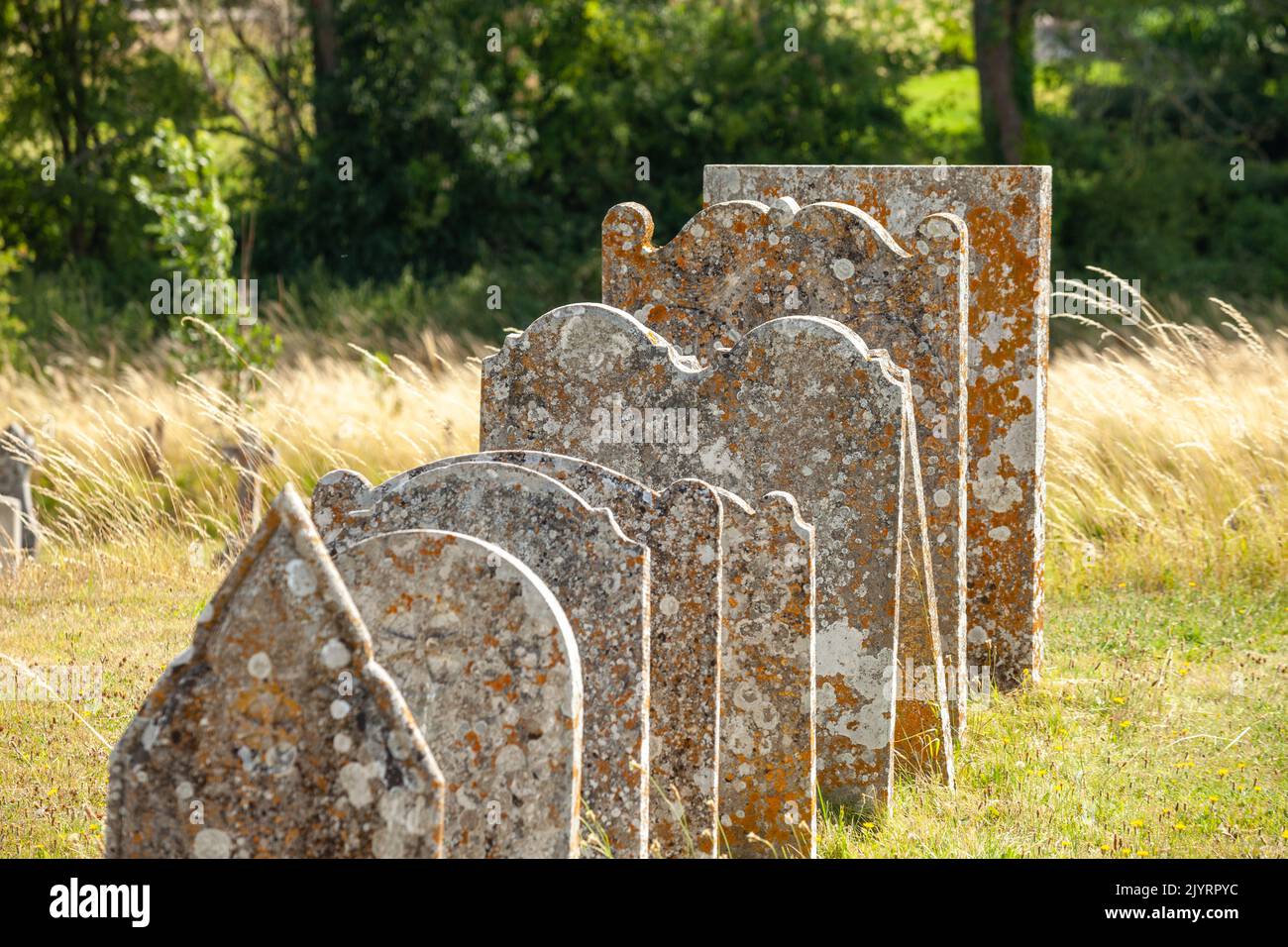 Old weathered headstones at St Andrews Church, Nether Wallop, Hampshire ...