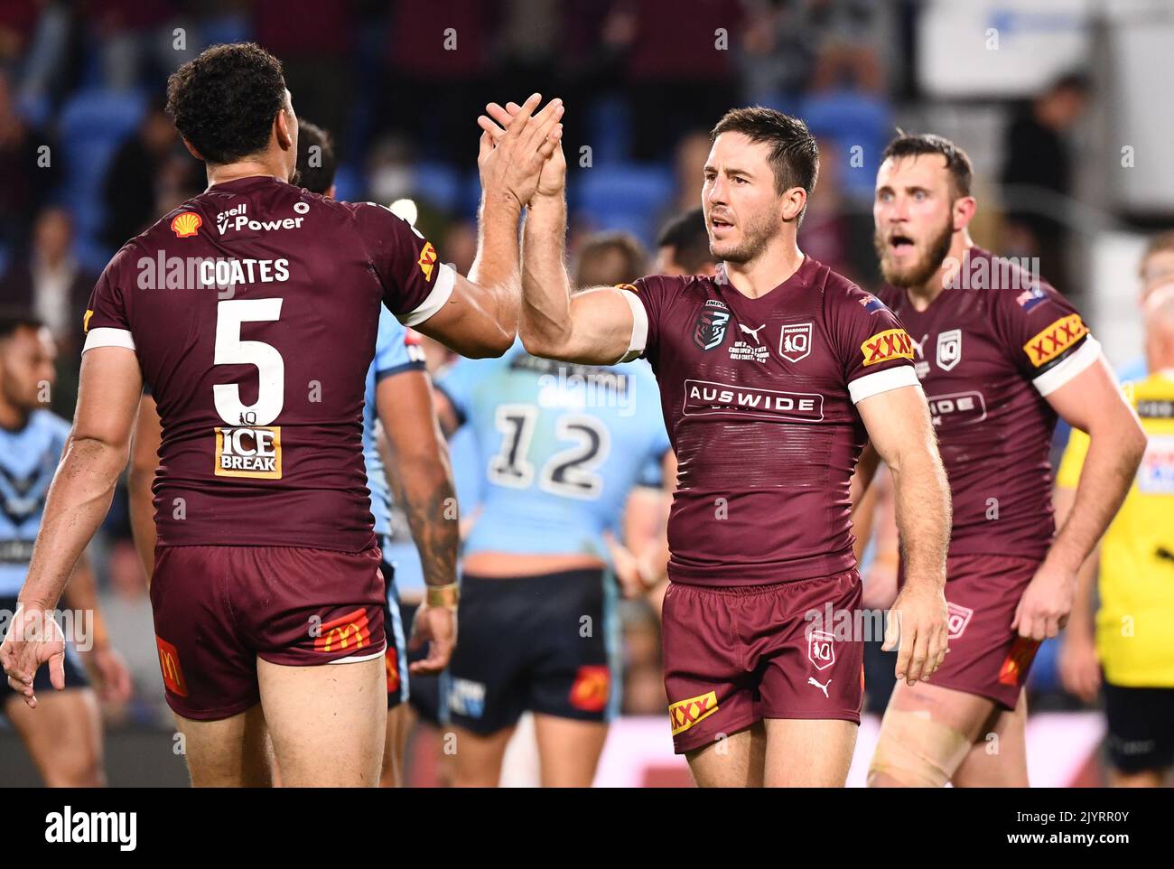 Ben Hunt of the Maroons celebrates after scoring a try during Game 3 of ...