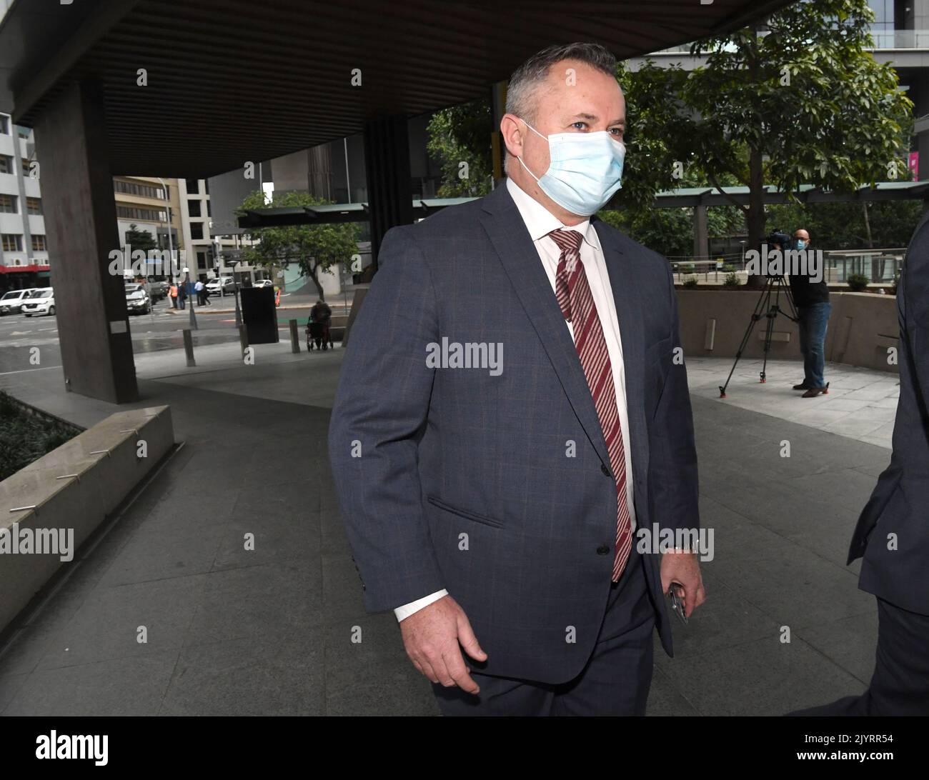 Lawyer Adam Magill is seen arriving at the Brisbane Magistrates Court ...