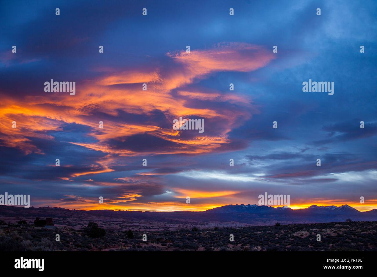 Colorful sunrise over the La Sal Mountains as seen from the La Sal ...