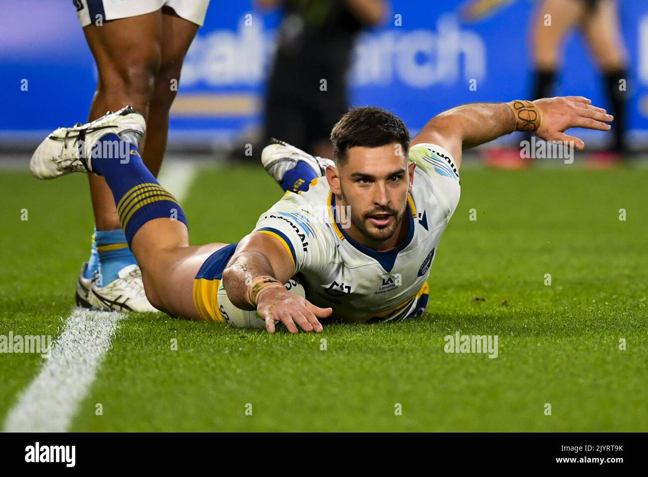 Ryan Matterson of the Eels celebrates after scoring a try during the ...