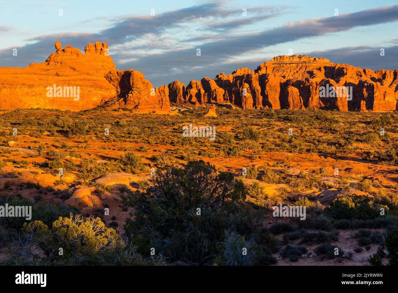 Ham Rock Butte and Elephant Butte with sunset light in Arches National ...