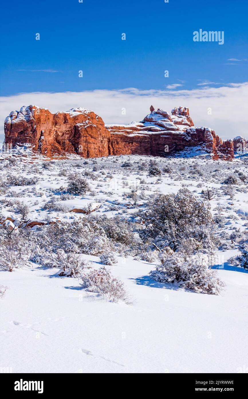 Ham Rock atop Ham Rock Butte after a winter snow in Arches National ...