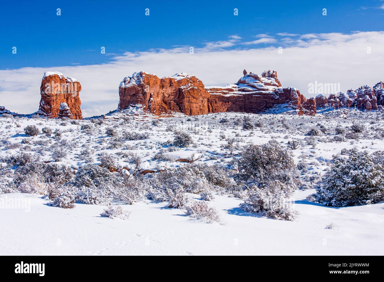Ham Rock atop Ham Rock Butte after a winter snow in Arches National ...