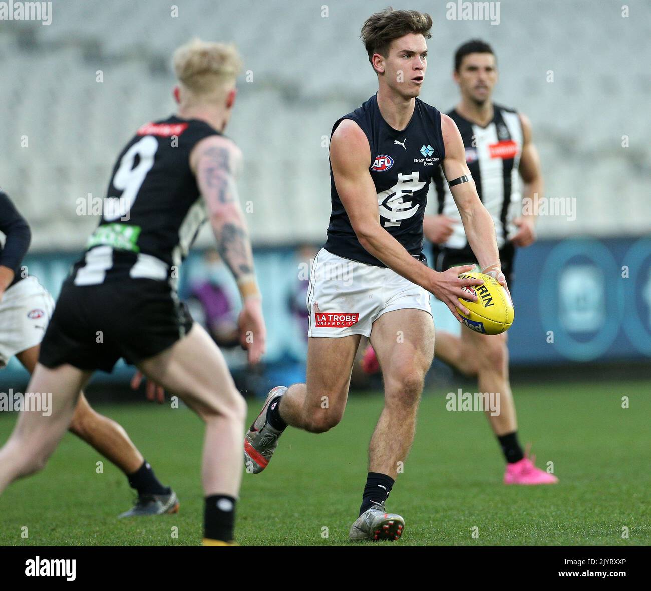 Paddy Dow of the Blues runs forward during the Round 18 AFL match ...