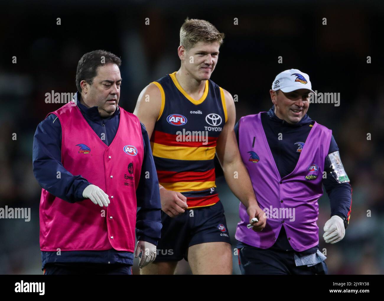Nick Murray of the Crows leaves the field injured during the Round 18 ...