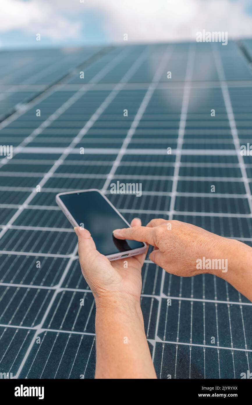 Engineer checking and inspecting at solar panel Stock Photo - Alamy