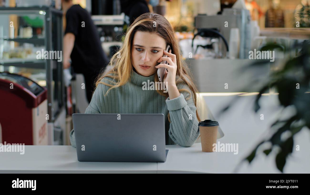 Serious business woman freelance manager worker student sitting at ...