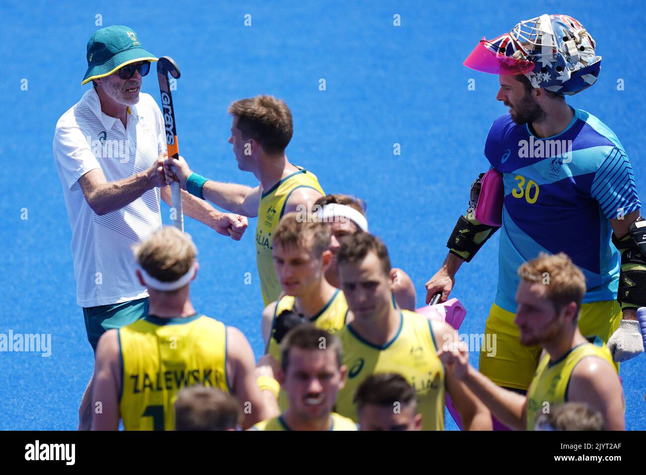 Australia’s coach Colin Batch congratulates his players after their win ...