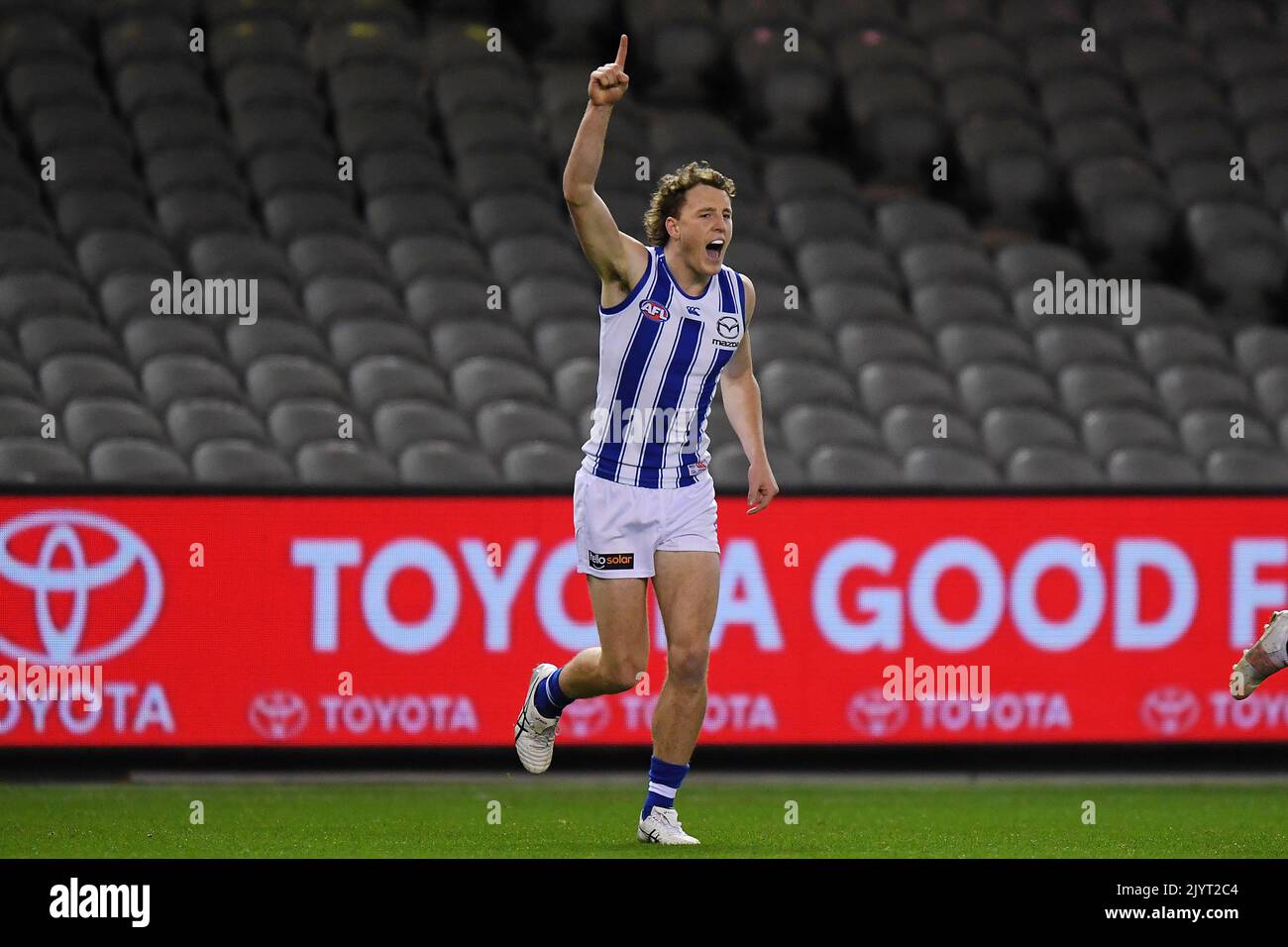 Nick Larkey of North Melbourne reacts after kicking a goal during the ...
