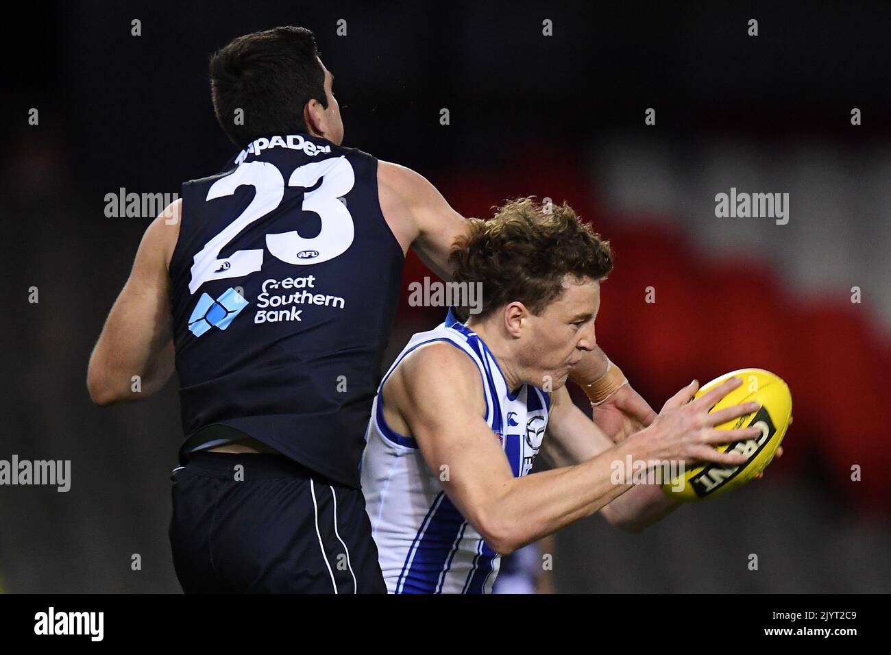Nick Larkey of North Melbourne (right) marks the footy during the AFL ...