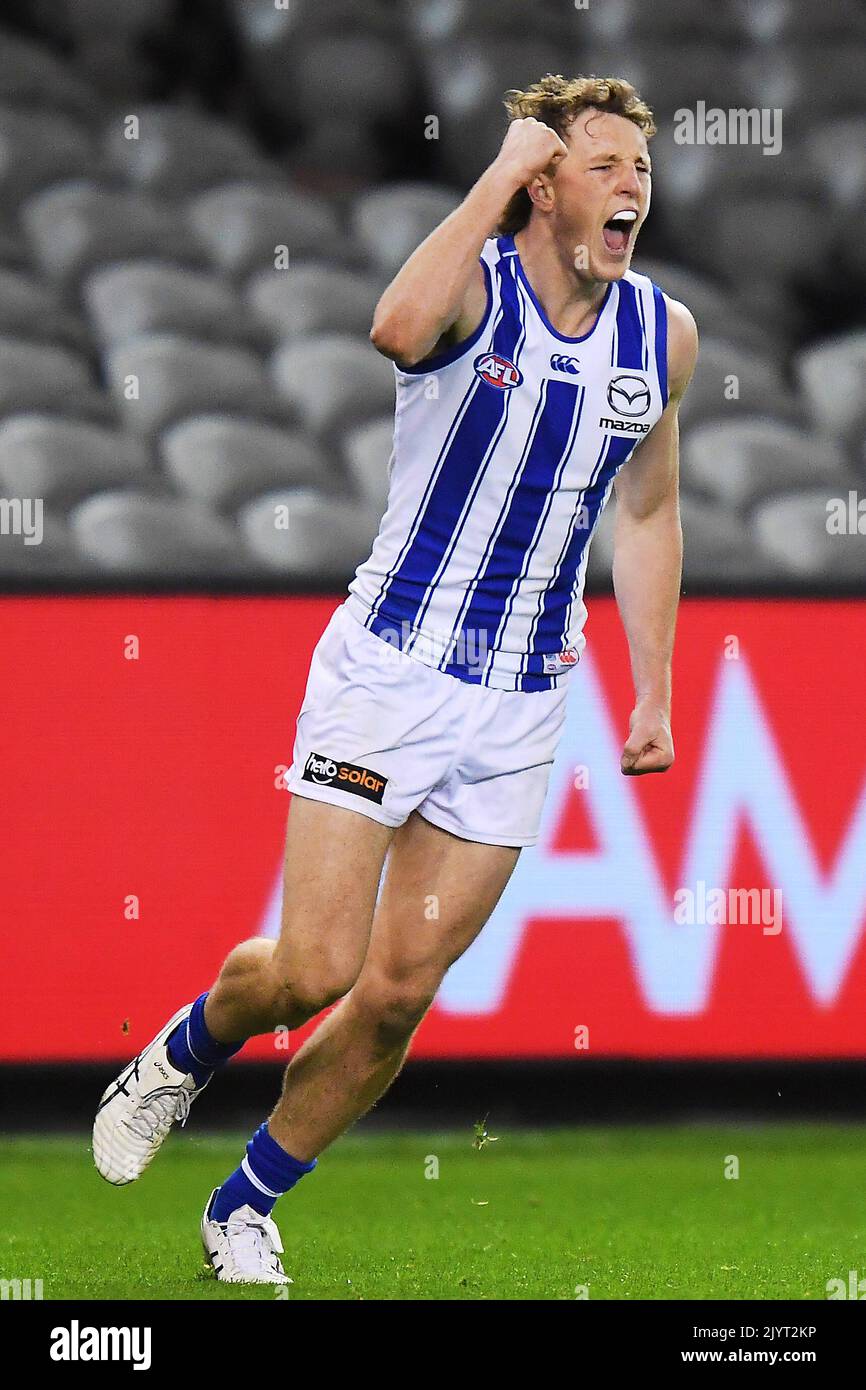 Nick Larkey of North Melbourne reacts after kicking a goal during the ...