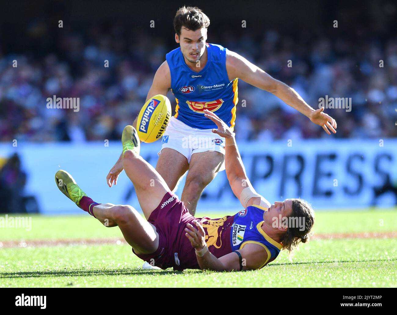 Jarrod Berry (bottom) of the Lions contests for the ball during the AFL ...