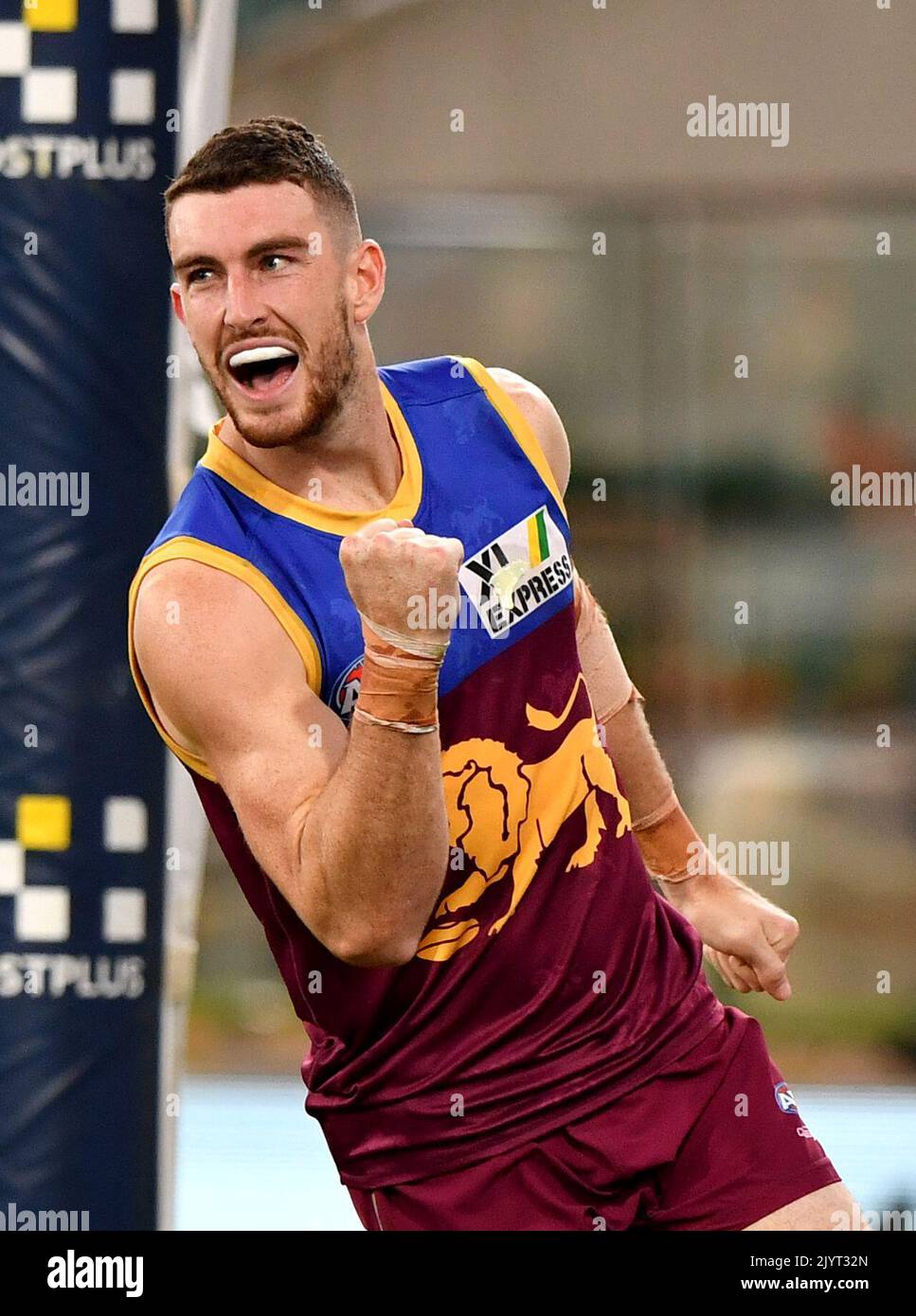 Daniel McStay of the Lions celebrates kicking a goal during the AFL ...