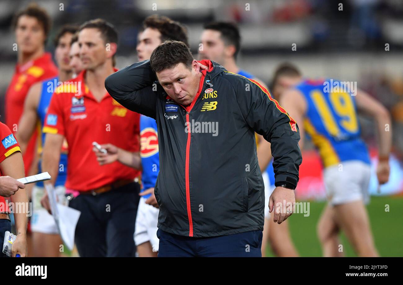 Suns coach Stuart Dew is seen during the AFL Round 19 match between the ...