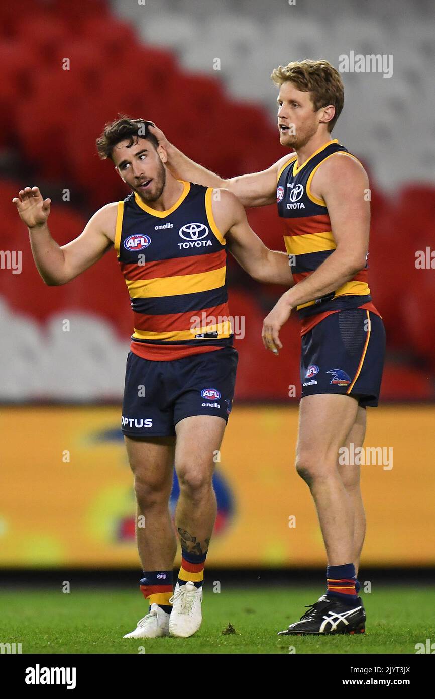Lachlan Murphy of the Adelaide Crows (left) celebrates with team mates ...