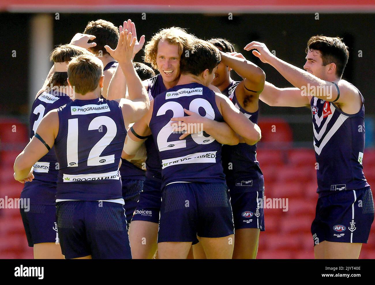 David Mundy of the Dockers (centre) reacts after kicking a goal during ...