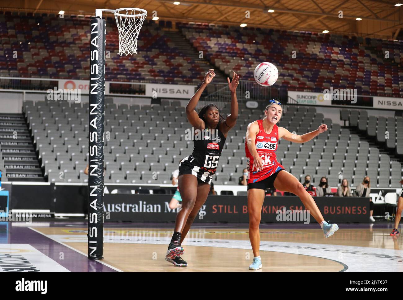 Shimona Nelson of the Magpies in action with Sarah Klay of the Swifts ...