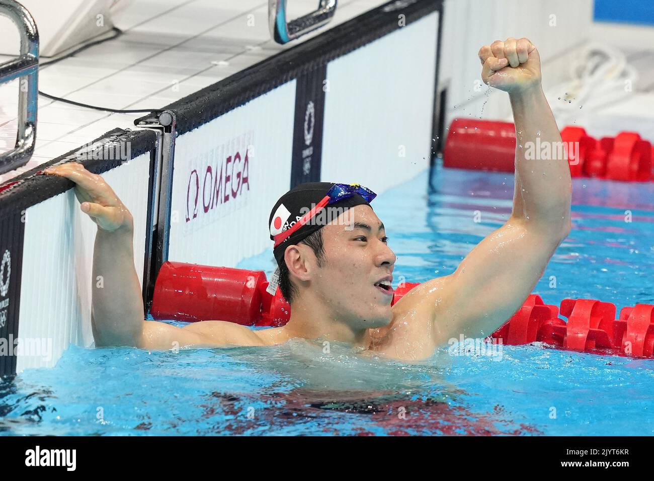 Tomoru Honda of Japan celebrates after winning silver in the Men’s 200m ...