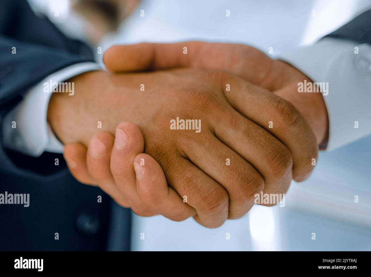 bottom view.handshake business people Stock Photo - Alamy