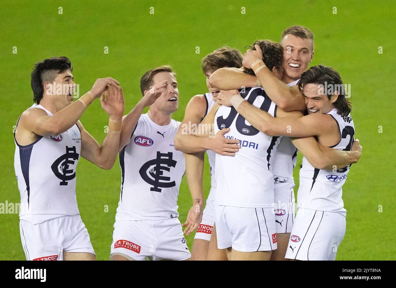Charlie Curnow of the Blues is congratulated by Patrick Cripps of the ...