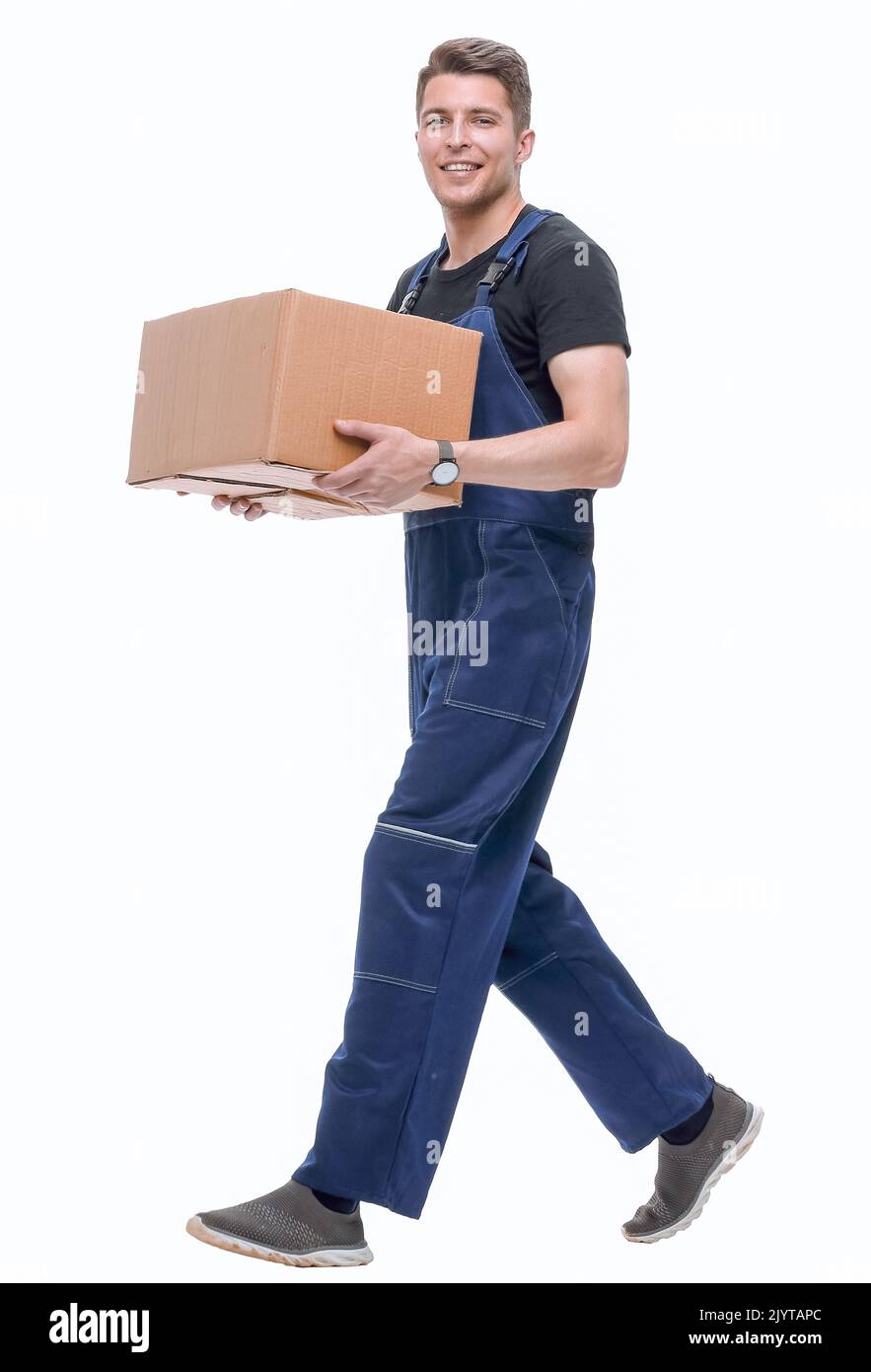 smiling worker with cardboard box stepping forward. isolated on white ...