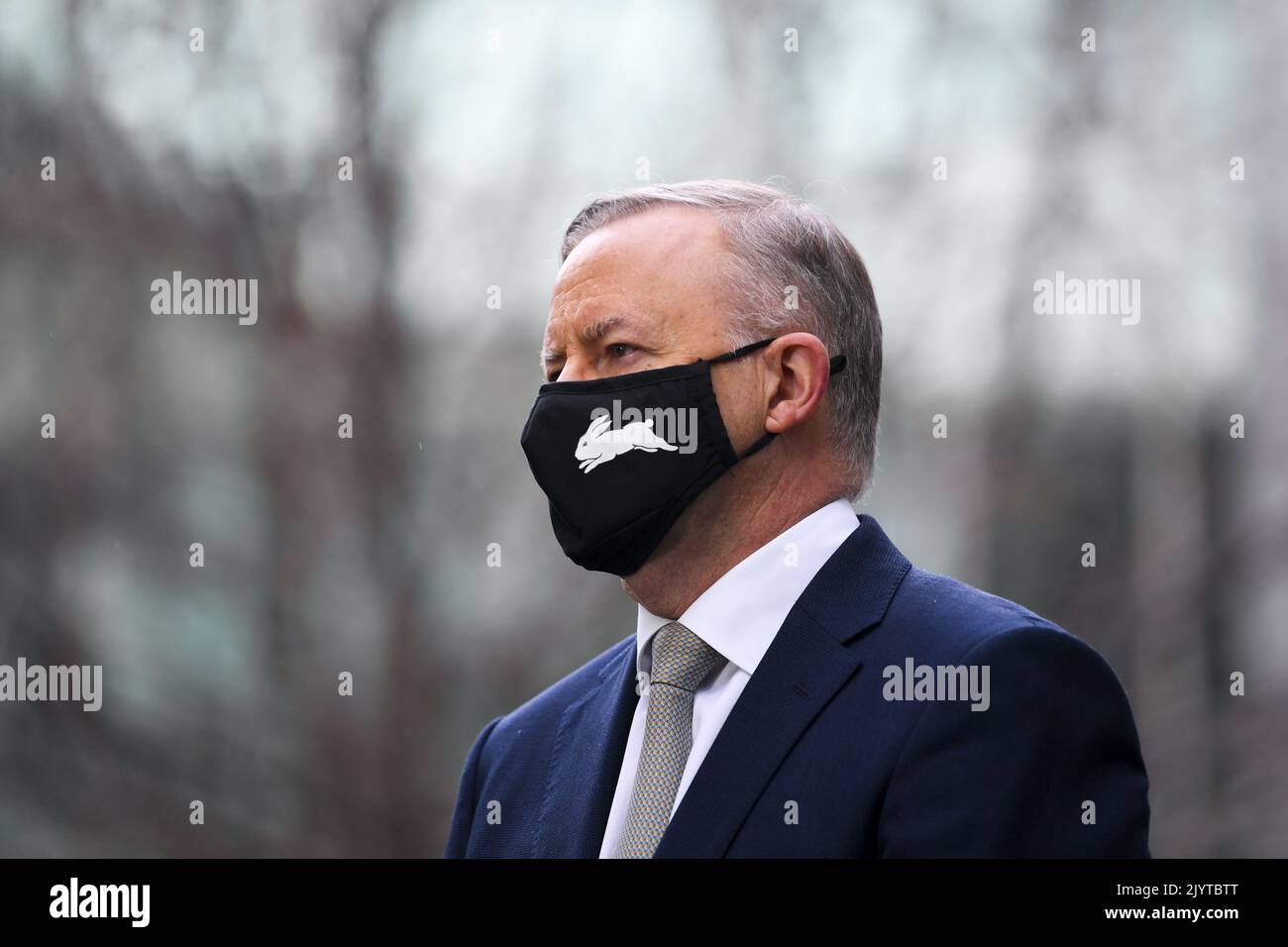 Australian Opposition leader Anthony Albanese wears a face mask during ...