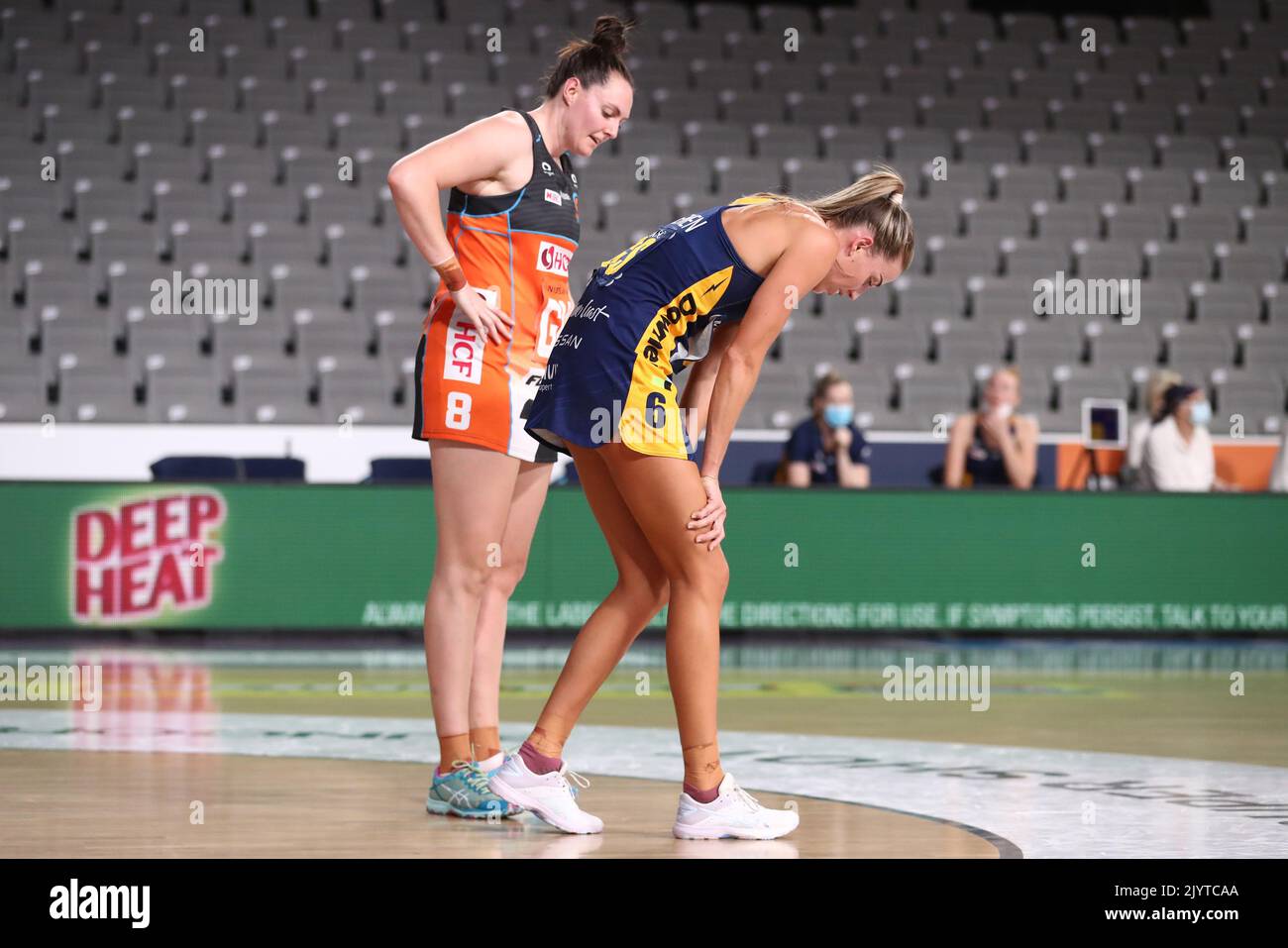 Cara Koenen of the Lightning is comforted by Sam Poolman of the Giants ...